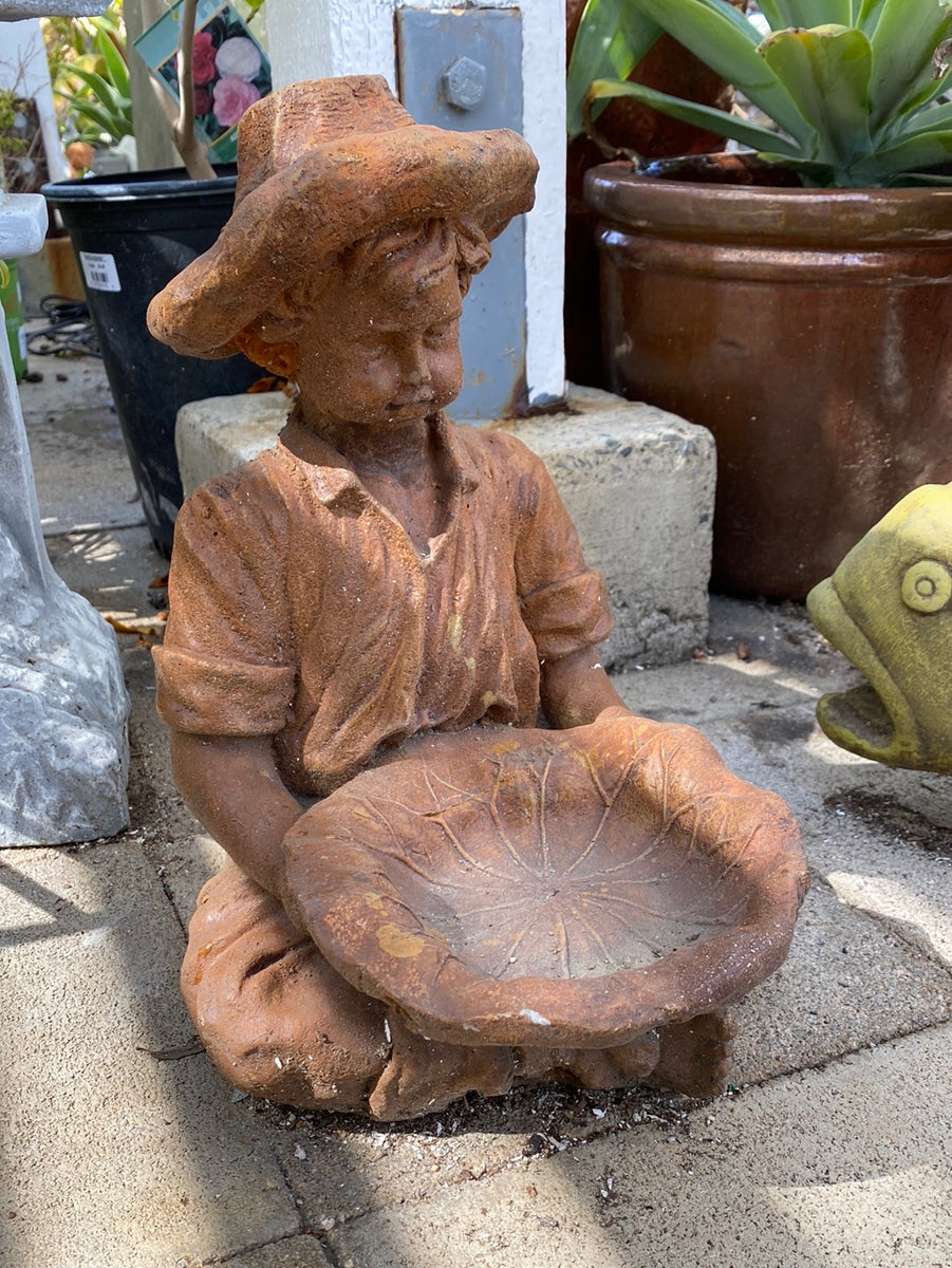 Farmer Statue – The Madd Potter